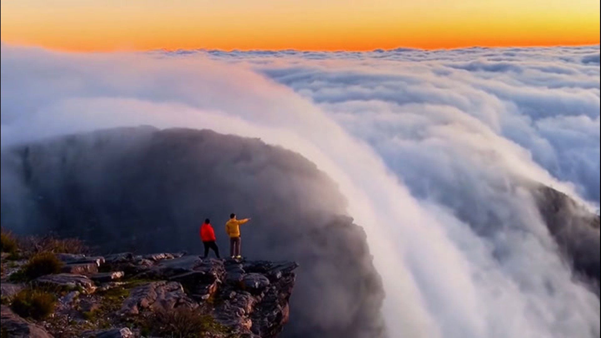 Clouds cascade down mountainside | ksdk.com
