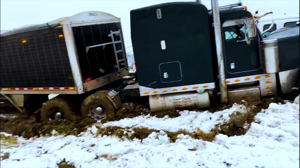 Truck slides off slick highway | ksdk.com
