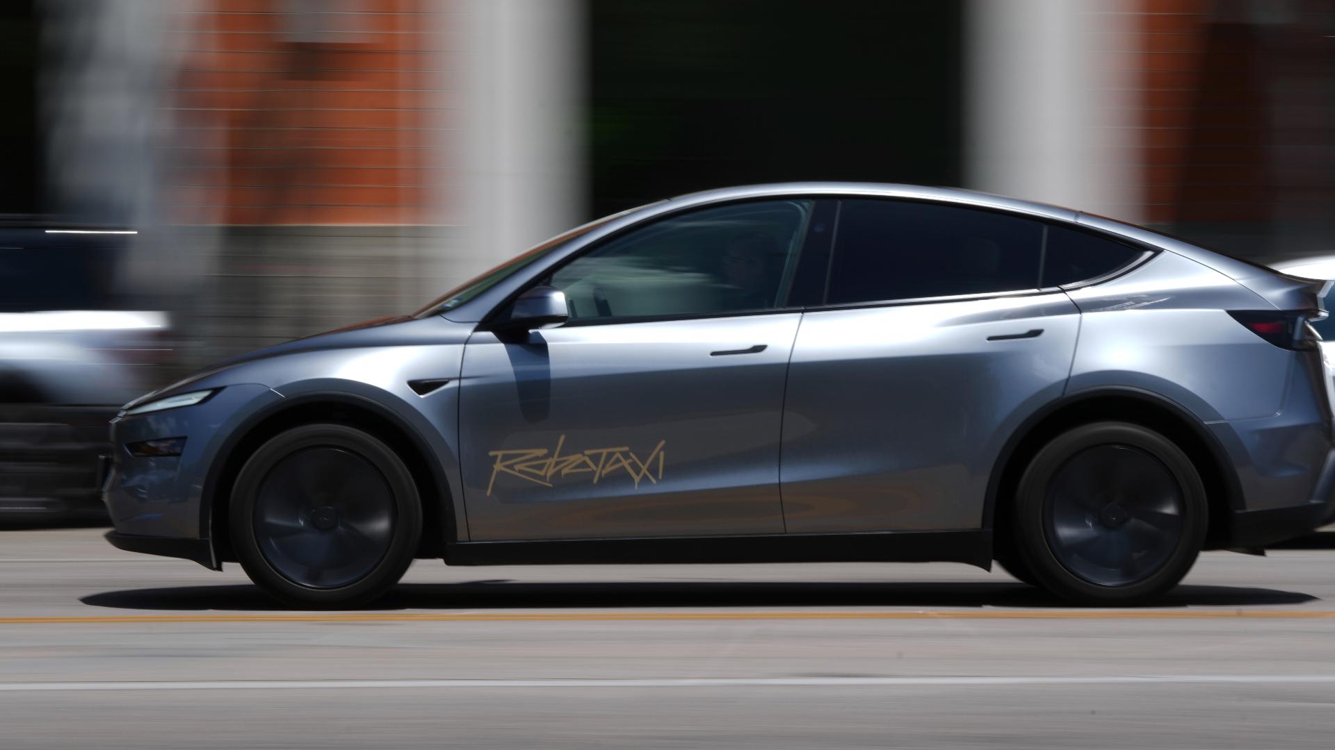 Video of Tesla 'robotaxis' raises questions with safety regulators ...