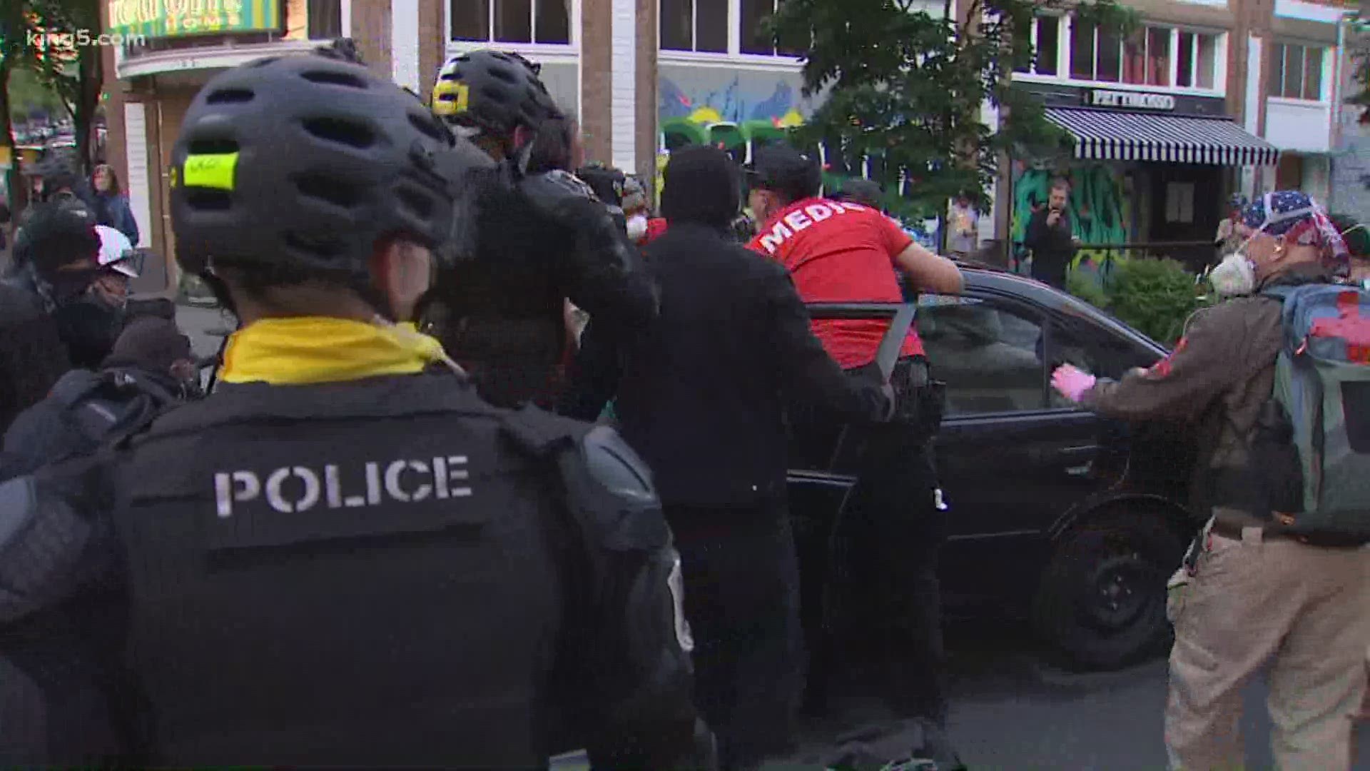 Man shot after suspect drives through crowd during Seattle protest ...