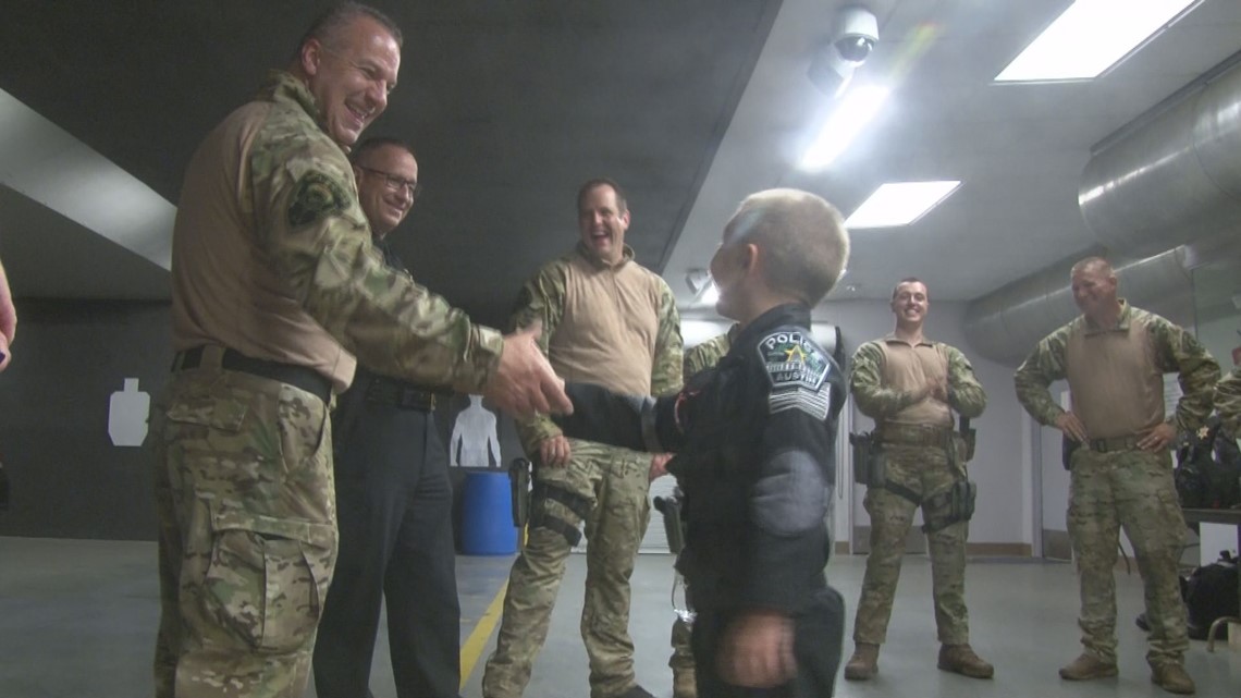 7-year-old builds bond with NC SWAT team | ksdk.com