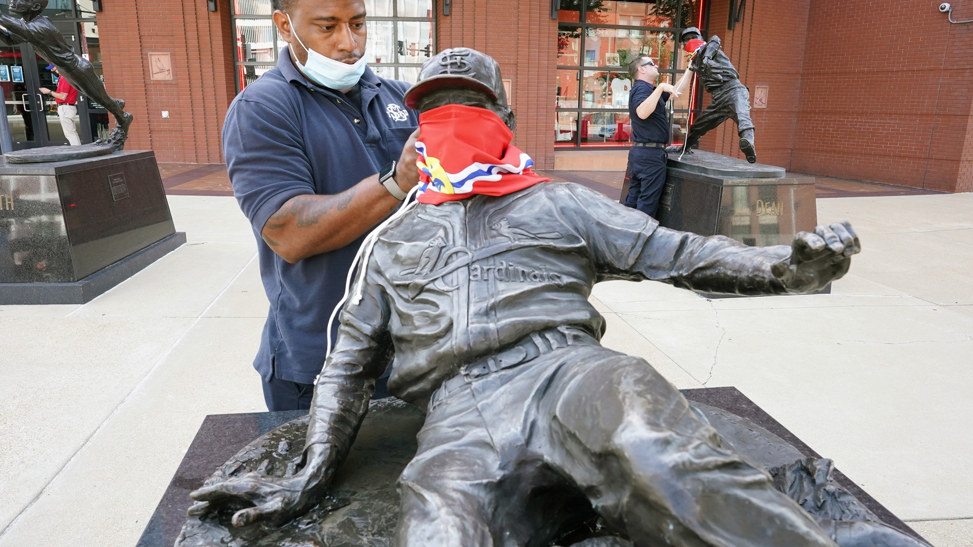 Masks installed on St. Louis statues | ksdk.com
