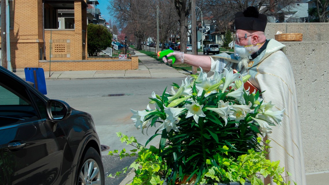 Detroit priest uses squirt bottle to spray holy water | ksdk.com