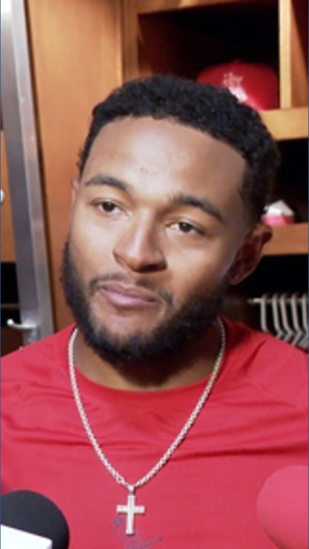 St. Louis Cardinals center fielder Victor Scott II talks with media ...