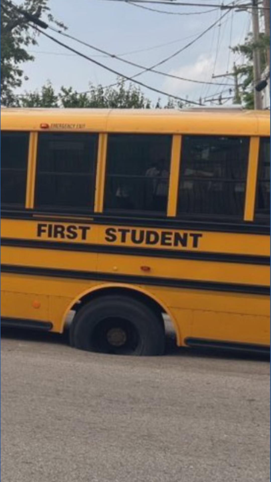 St. Louis' school bus trapped in sinkhole; 12 kids rescued | ksdk.com