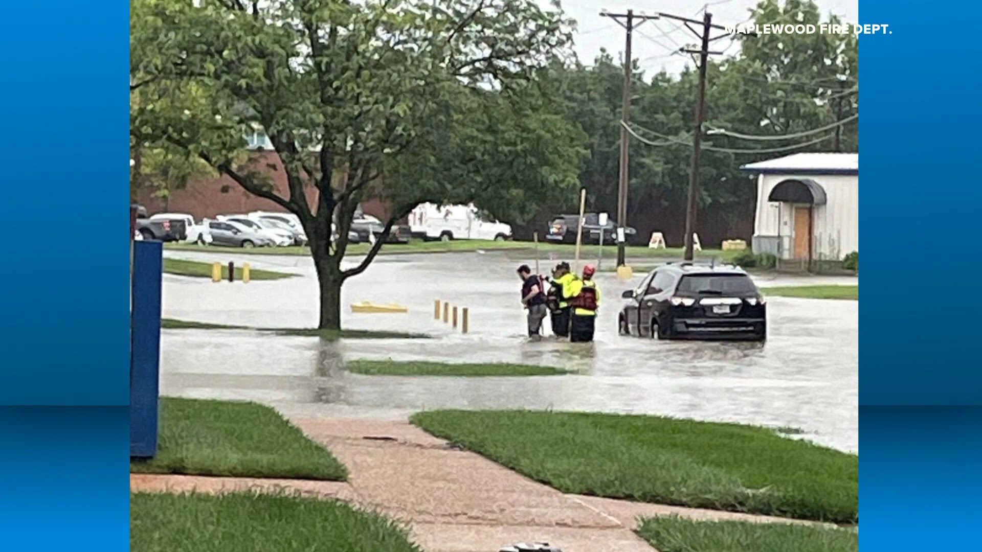 Firefighters rescue car from flooding | ksdk.com