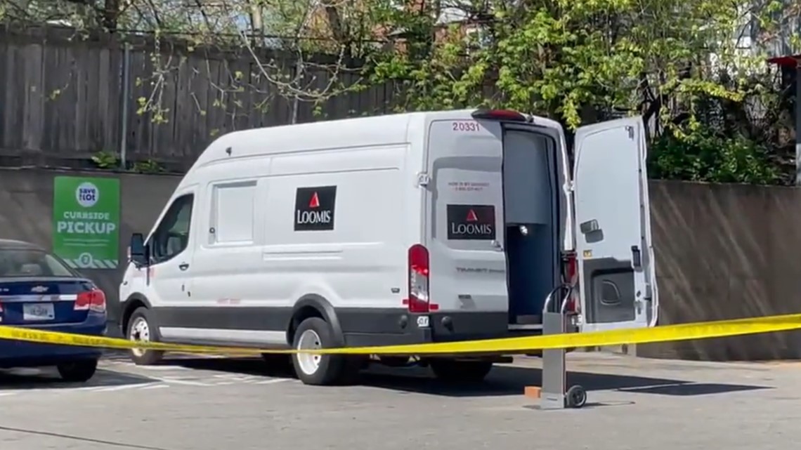 Suspects steal money, gun during Overland armored truck robbery | ksdk.com