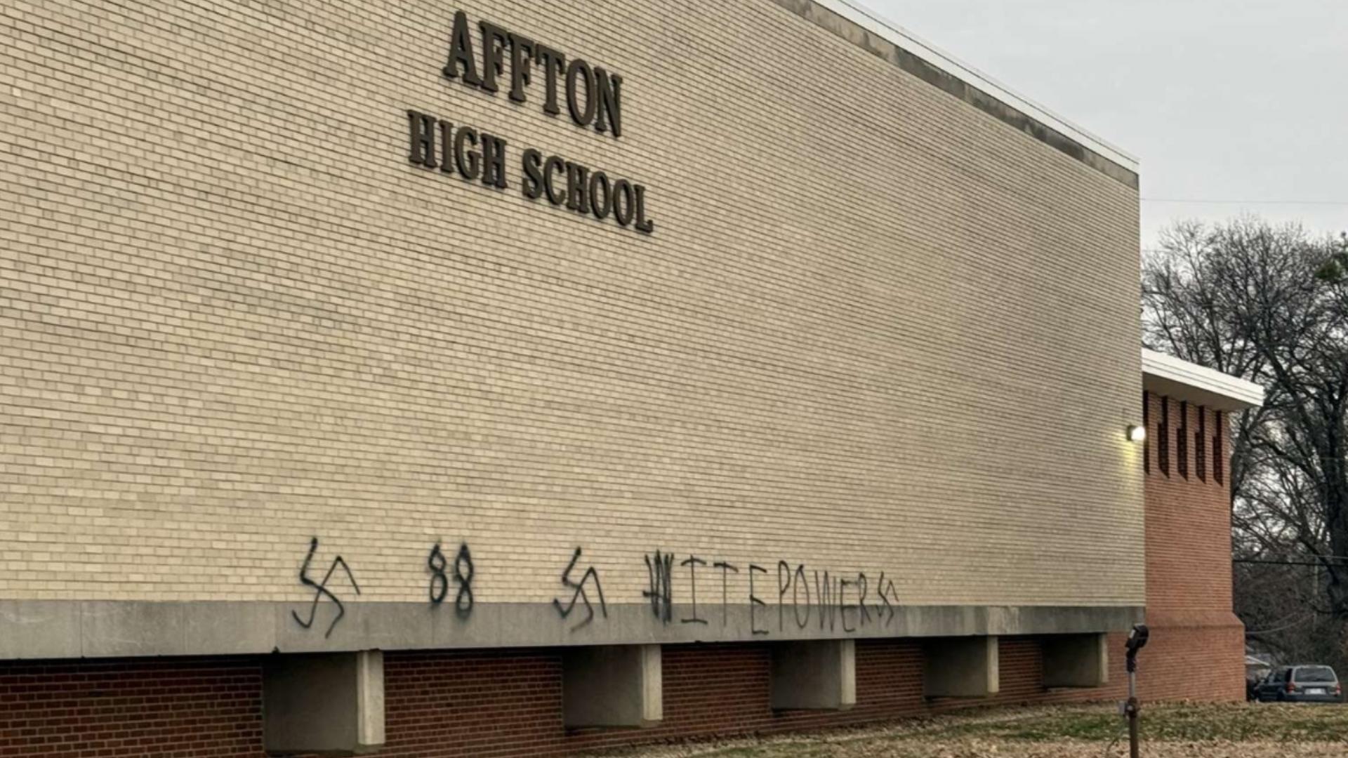 Affton High School vandalized with swastikas and racist message | ksdk.com