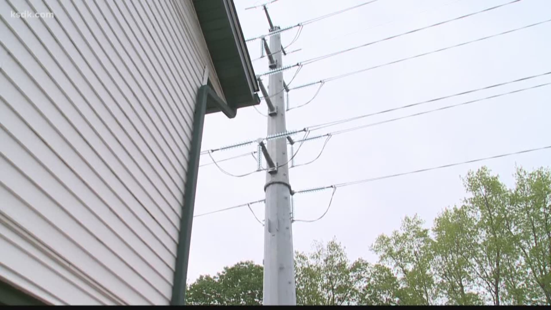 Family concerned about new power pole built just feet from their home ...