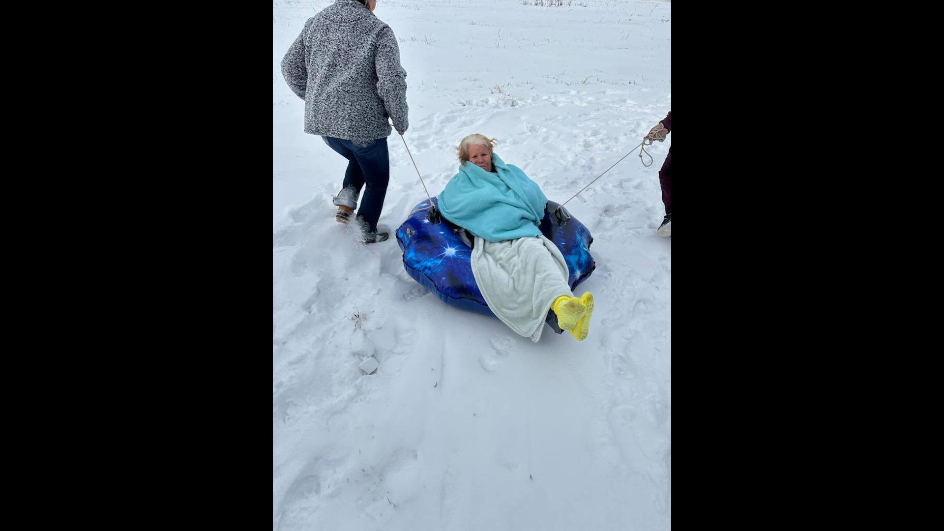 Older adult residents in Freeburg go tubing in the snow | ksdk.com