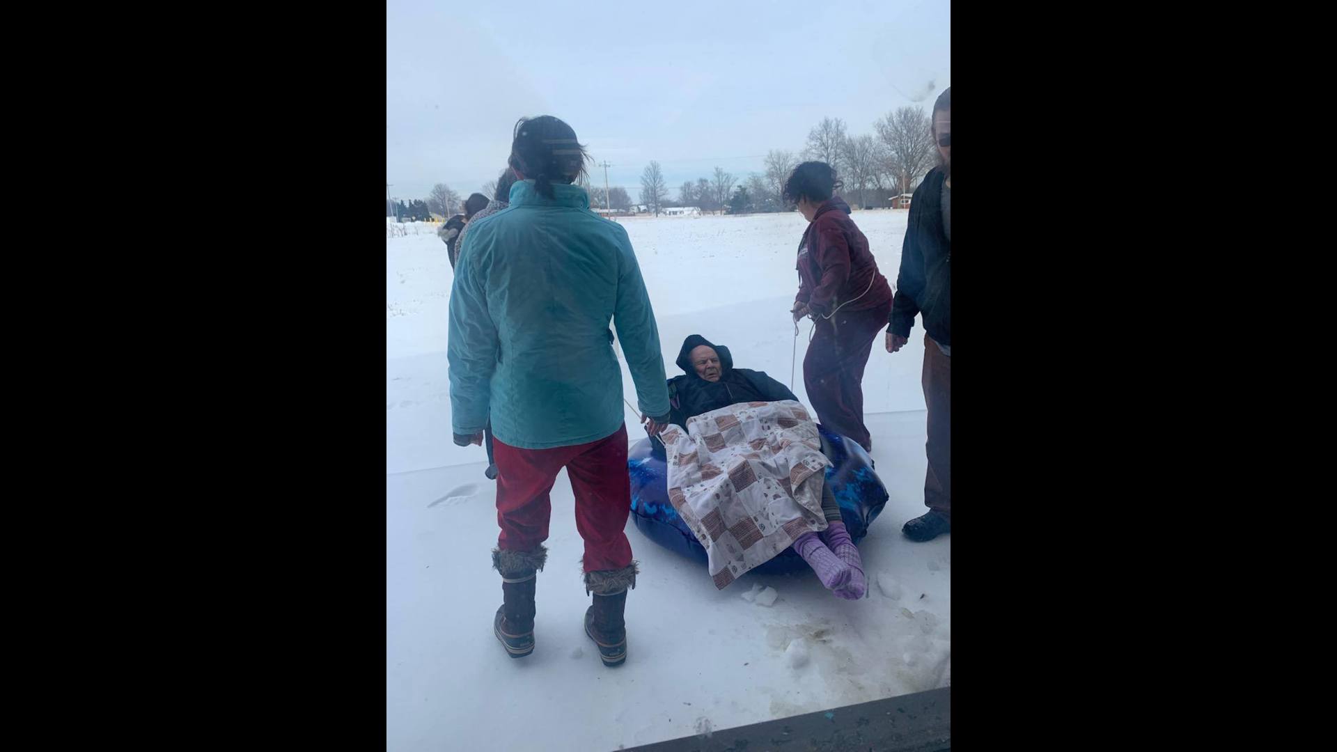 Older adult residents in Freeburg go tubing in the snow | ksdk.com