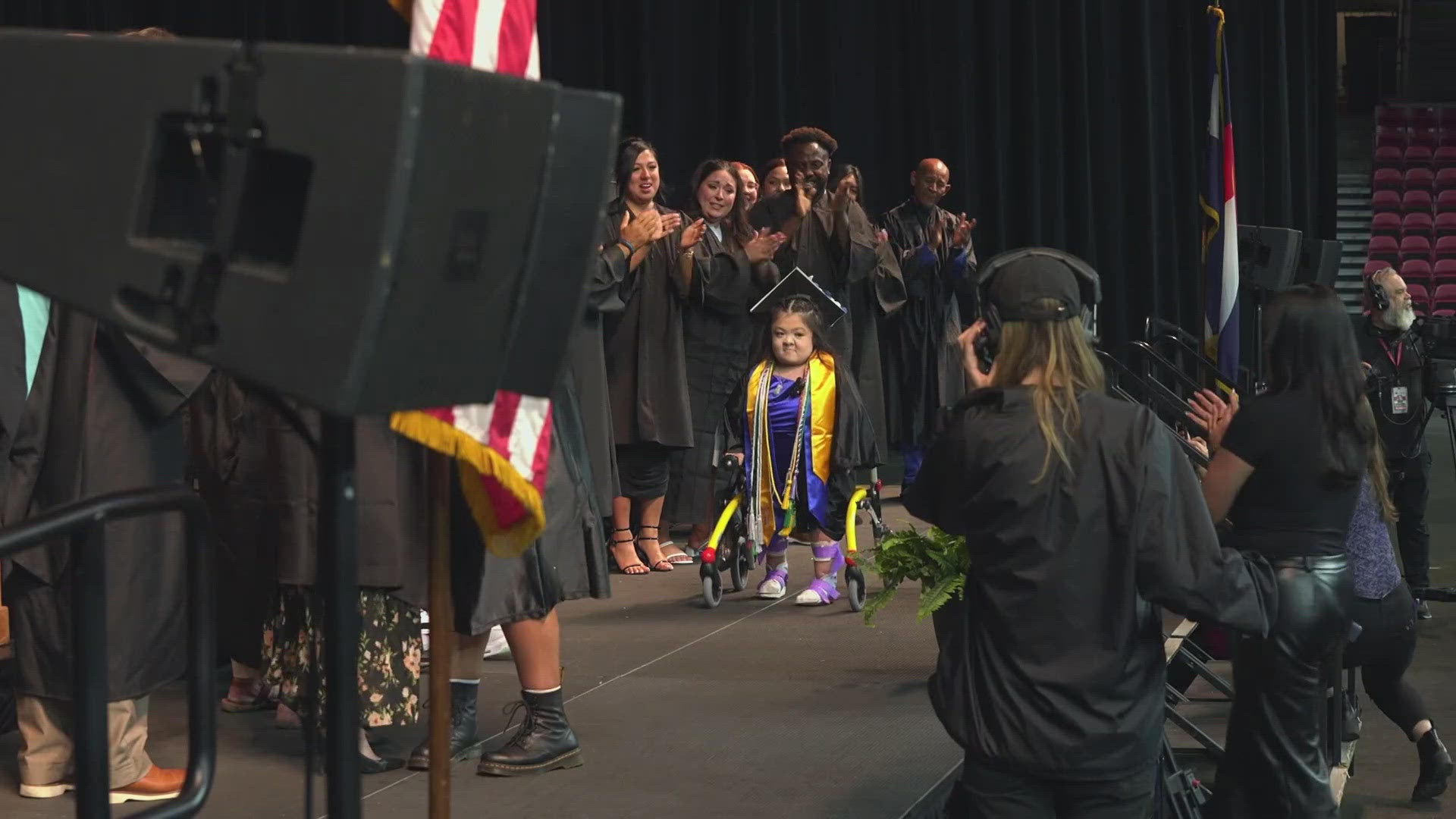 Zoey Ngu stuns classmates by walking across the stage at Denver ...