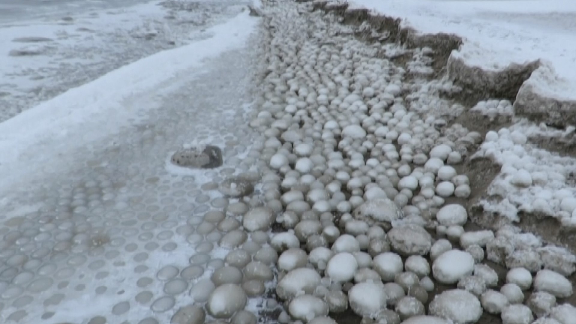 Thousands of 'ice eggs' wash up on Finland beach | ksdk.com